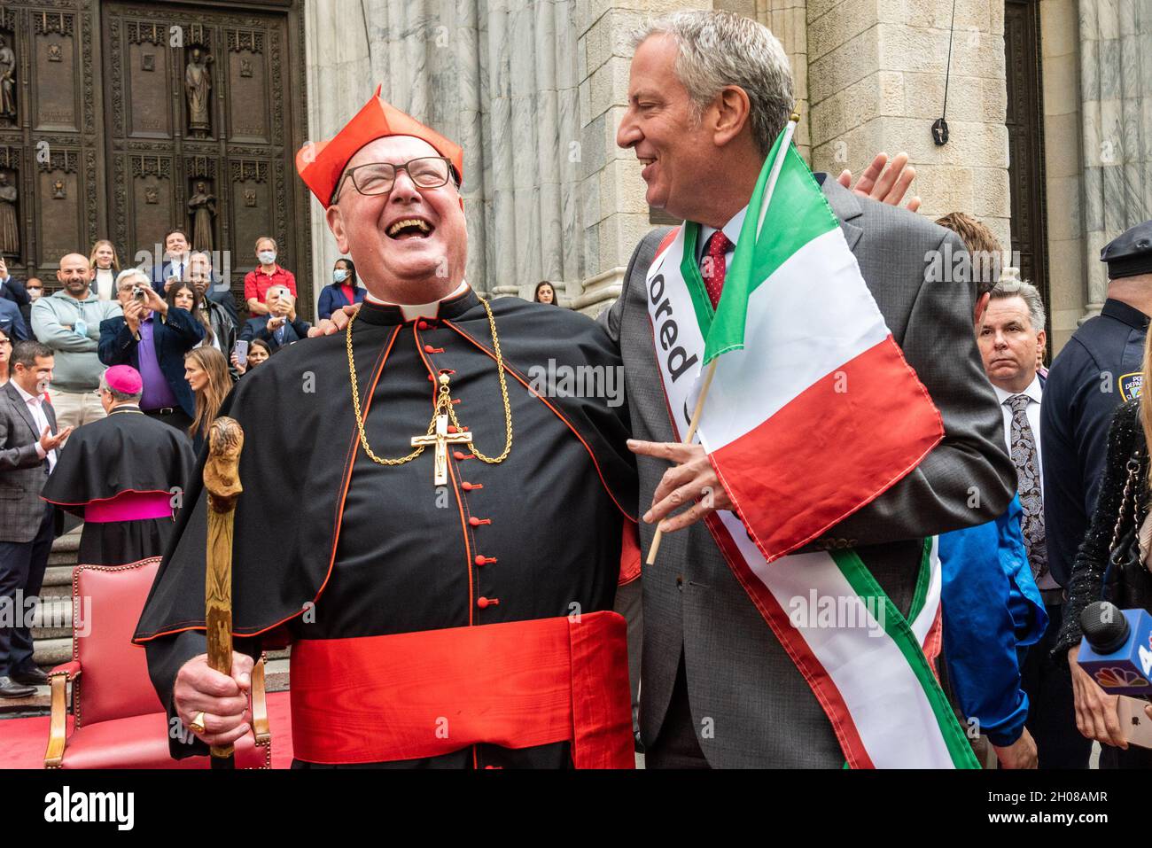 Cardinal Timothy Dolan and Mayor Bill de Blasio joke around during the ...