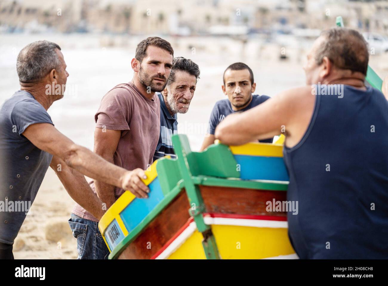 LUZZU, Jesmark Scicluna (left of center), 2021. © Kino Lorber ...
