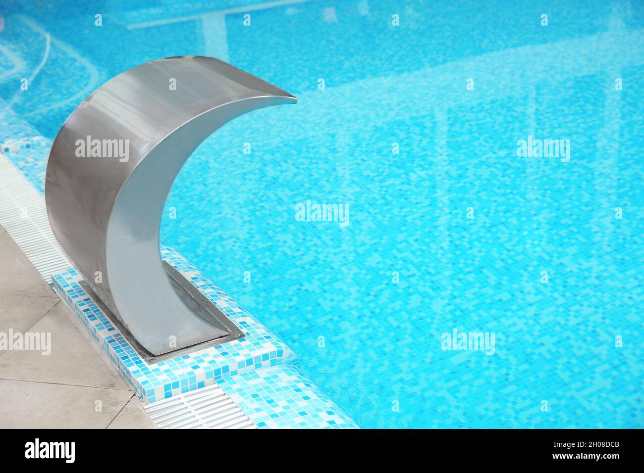 Swimming pool with refreshing blue water. Time to relax Stock Photo - Alamy