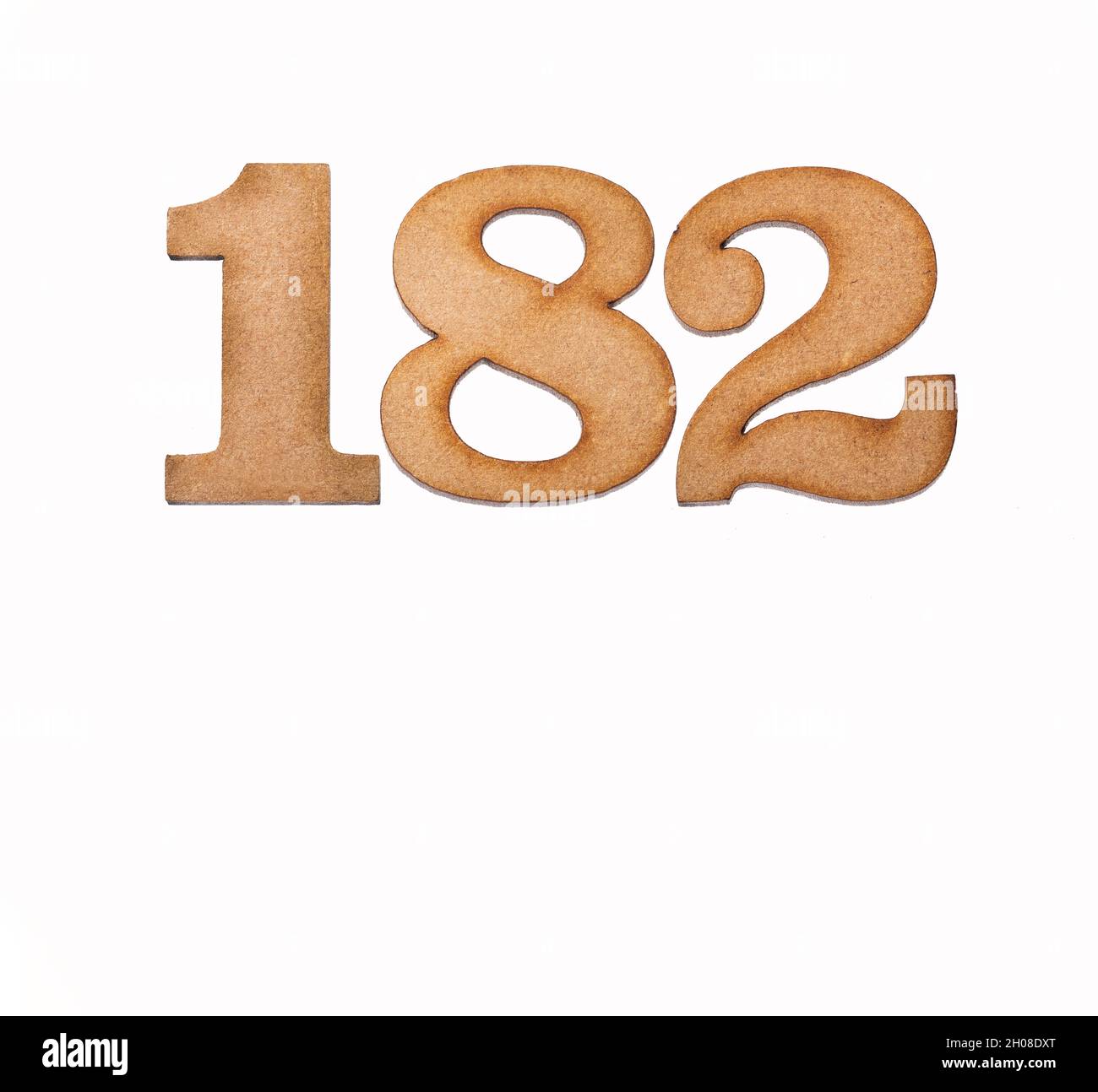 Number 182 in wood, isolated on white background Stock Photo - Alamy