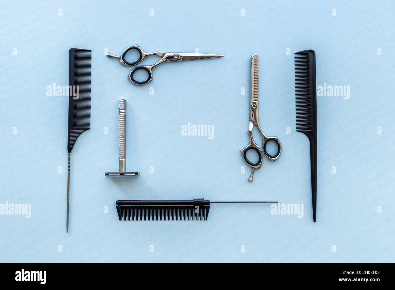 Set of barber shop equipment with hairdressing scissors and combs Stock ...