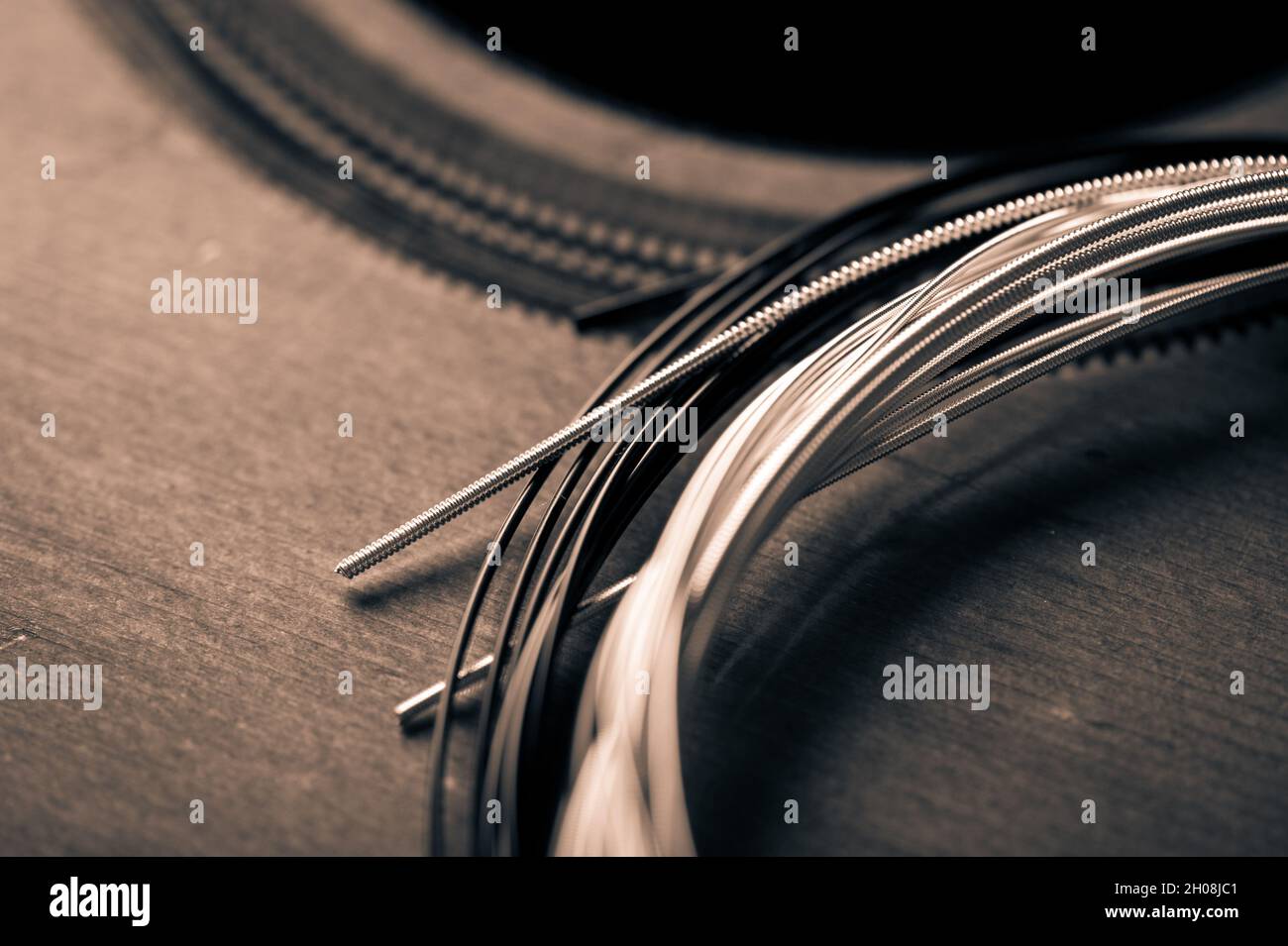 abstract new nylon core guitar strings. Restring classical guitar ...