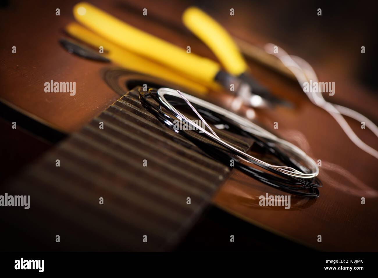 Restring classical guitar concept. Closeup at the new strings Stock ...