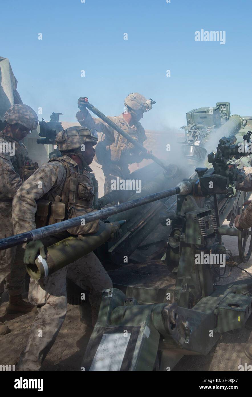 U.S. Marine Corps Lance Cpl. Markus Harris, a field artillery cannoneer ...