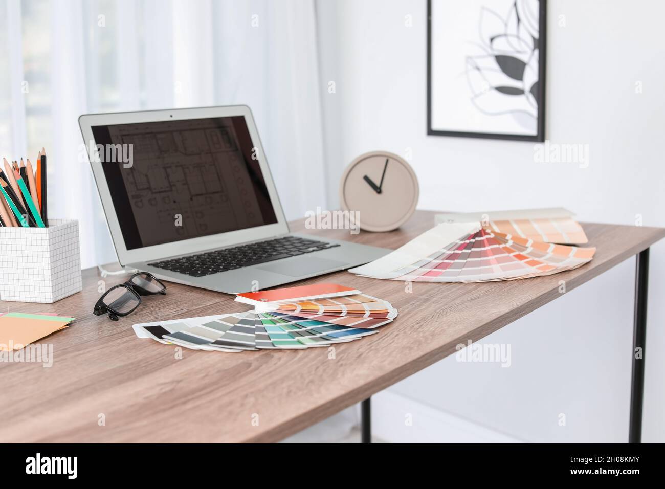 Color palette on table in designer's office Stock Photo - Alamy