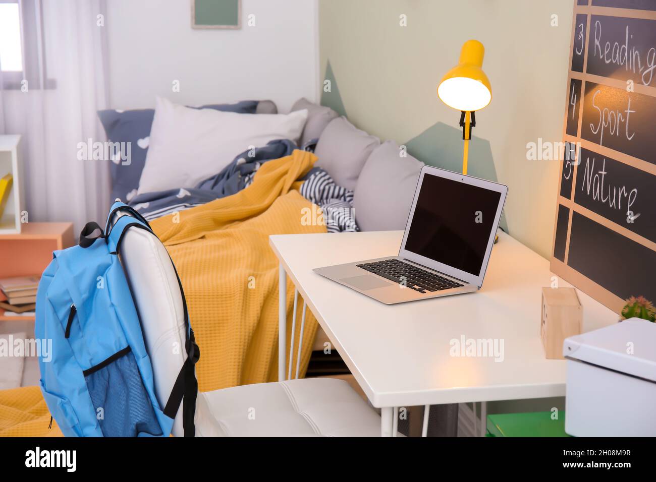 Modern child room interior with desk and laptop Stock Photo - Alamy