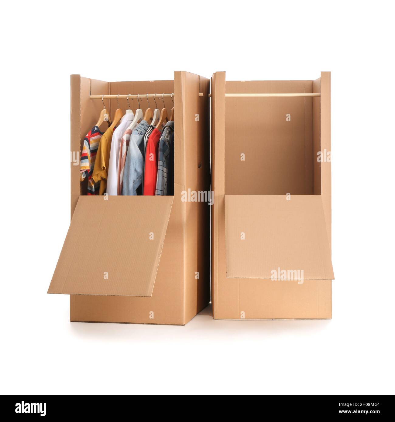 Cardboard wardrobe boxes with clothes on white background Stock Photo ...
