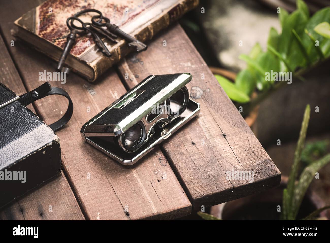 Closeup vintage folding opera glasses. Old compact binoculars Stock ...