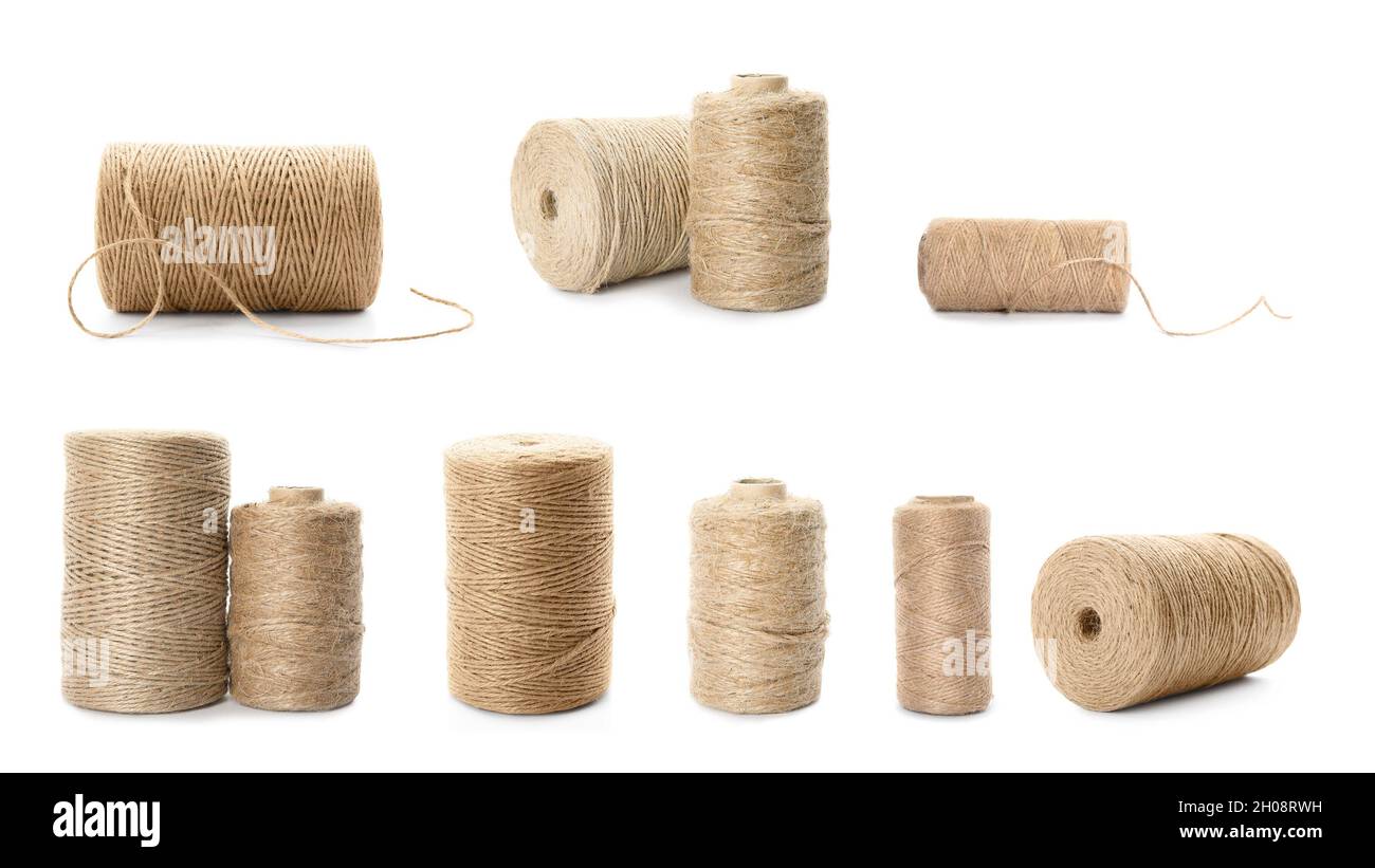 Set with spools of hemp rope on white background Stock Photo - Alamy