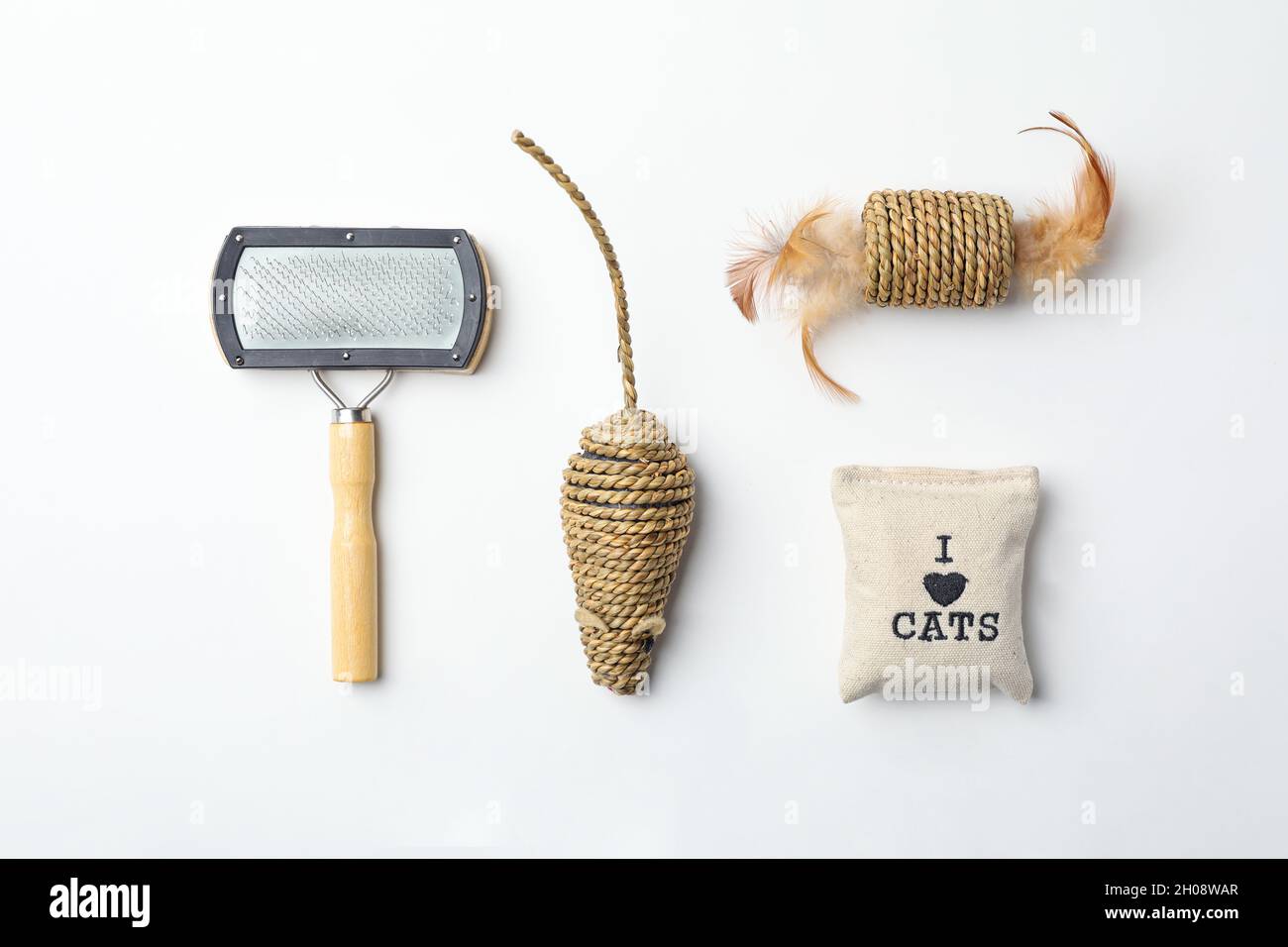 Flat lay composition with accessories for cat on white background. Pet ...