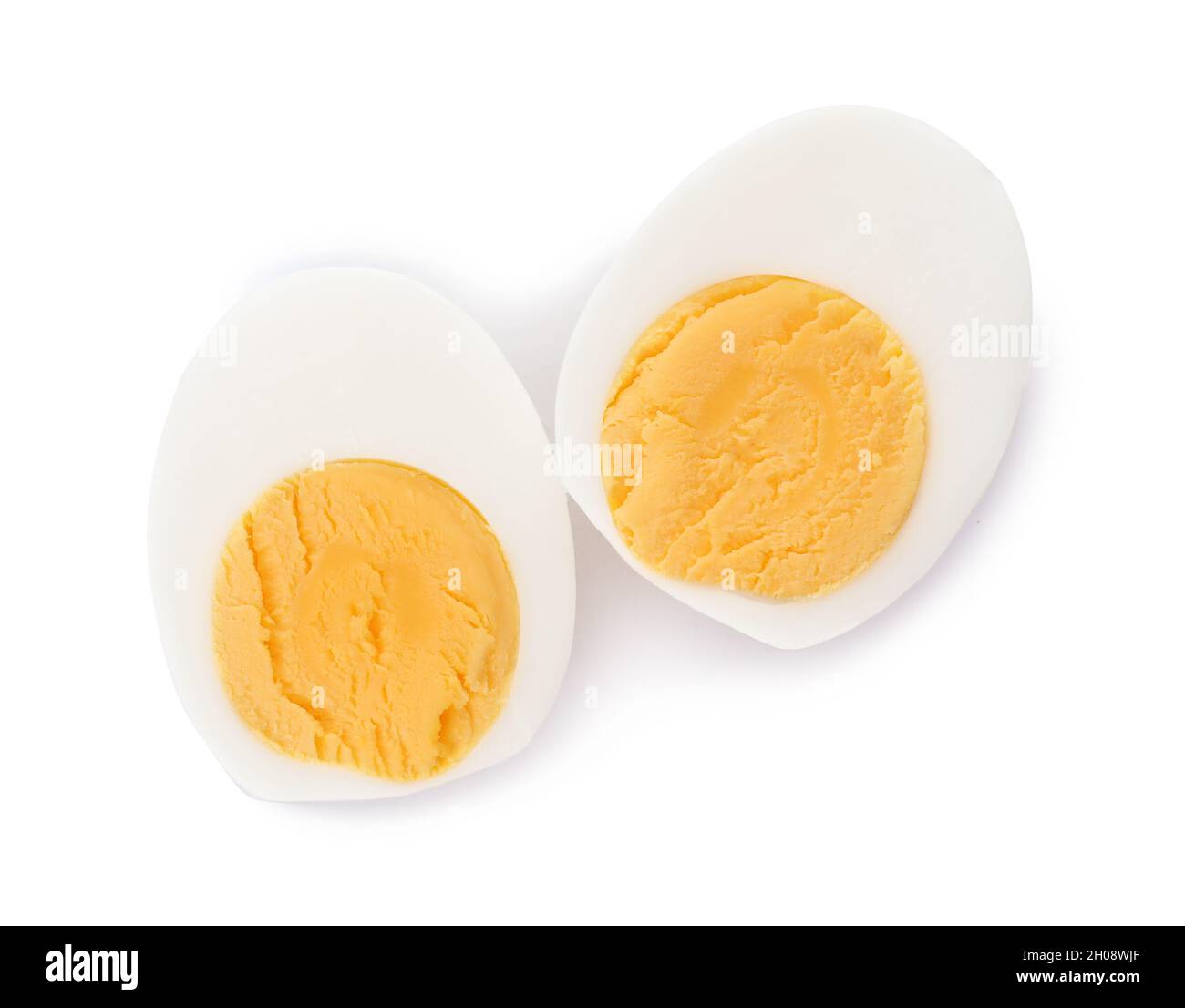 Sliced hard boiled egg on white background Stock Photo - Alamy