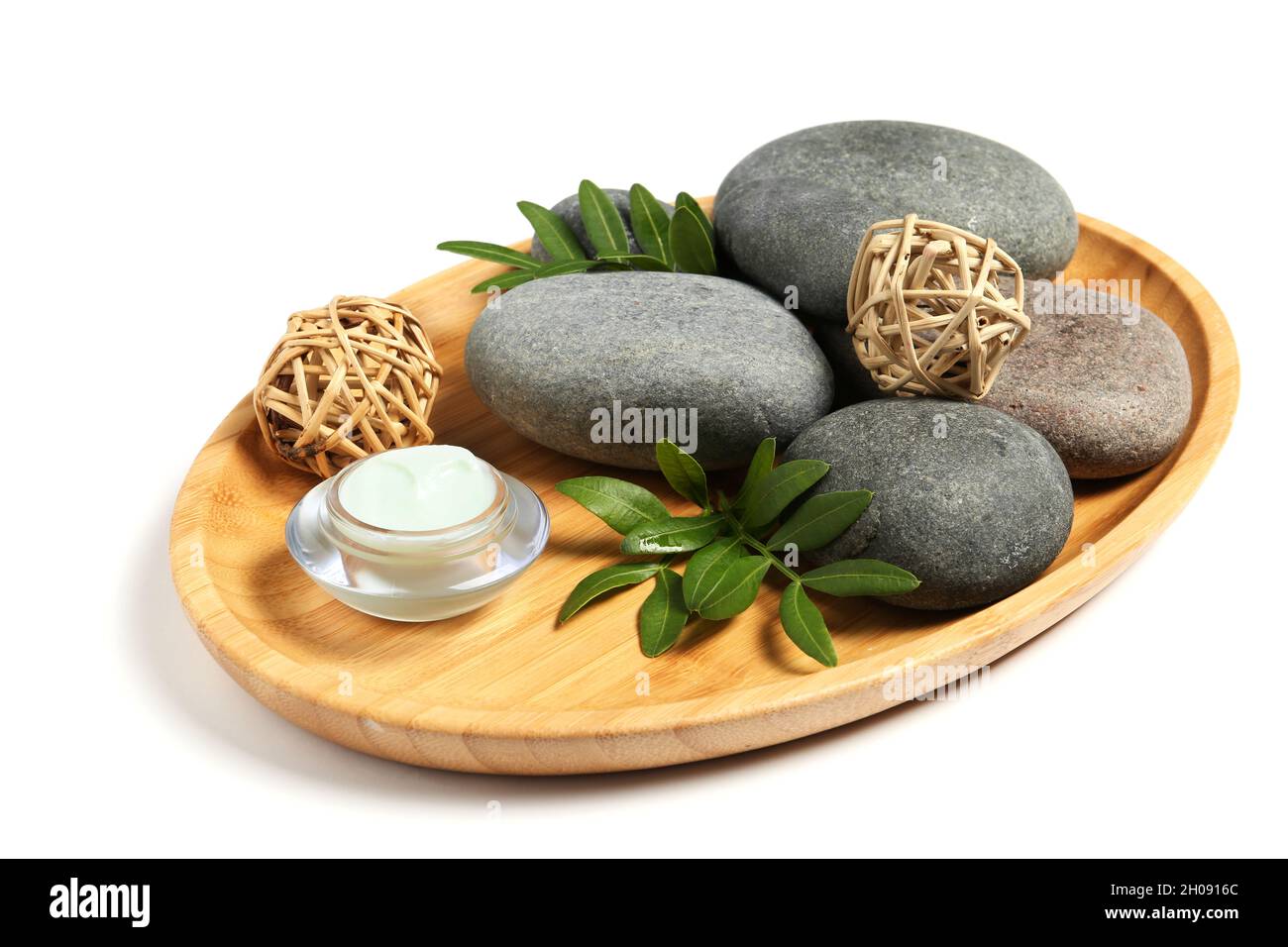 Composition with spa stones on white background Stock Photo - Alamy