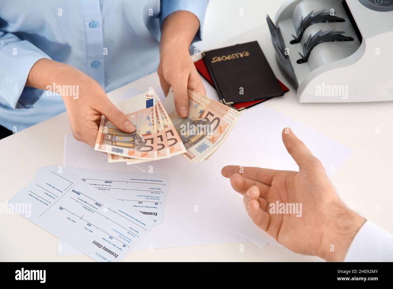 Man receiving money from teller at cash department, closeup Stock Photo ...