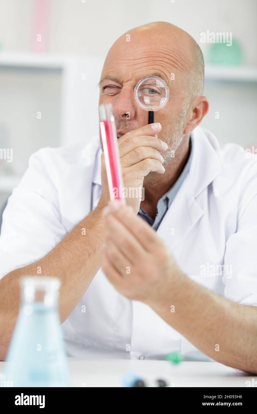 Portrait young scientist explaining hi-res stock photography and images ...