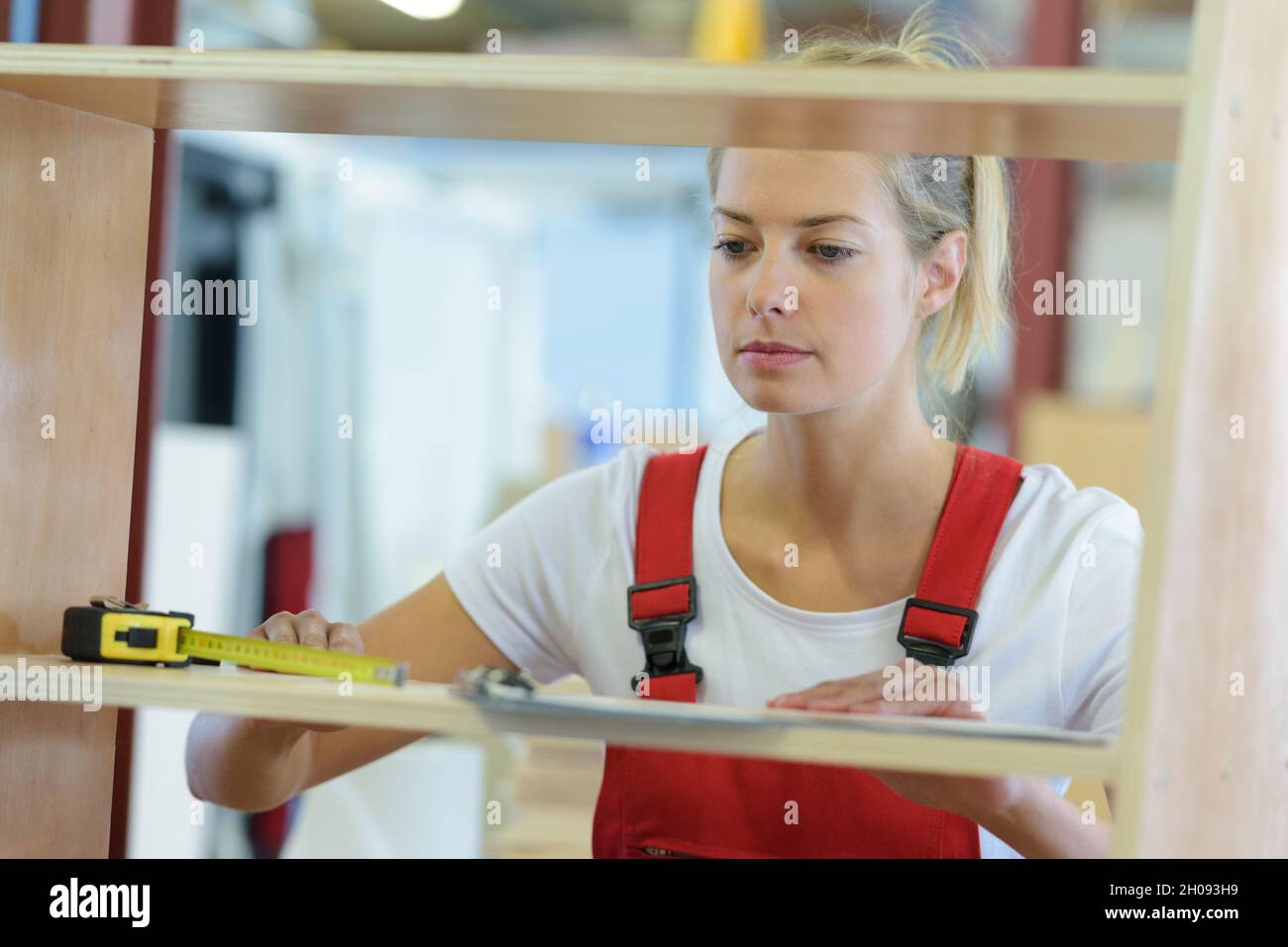Female construction worker toolkit hi-res stock photography and images ...