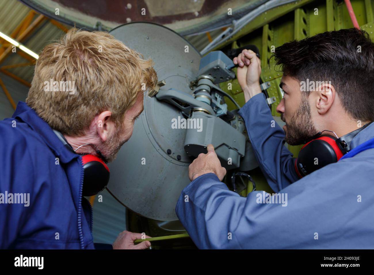 the heavy equipment maintenance team Stock Photo - Alamy