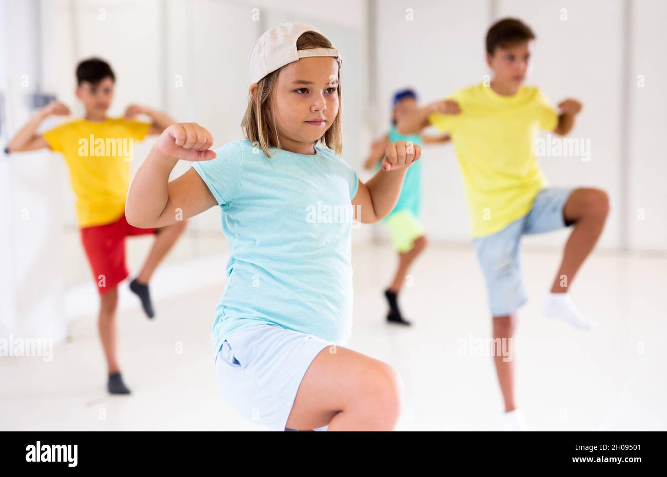 Group of kids performing hip-hop dance Stock Photo - Alamy