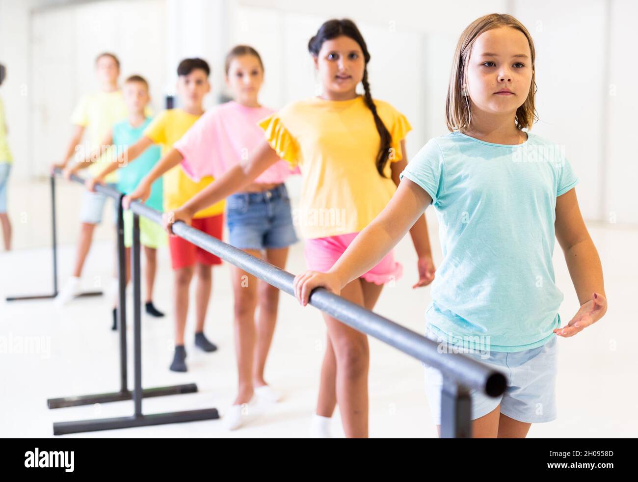 Group of children practicing in ballroom studio Stock Photo - Alamy