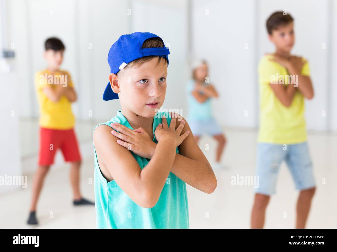 Group of kids performing hip-hop dance Stock Photo - Alamy