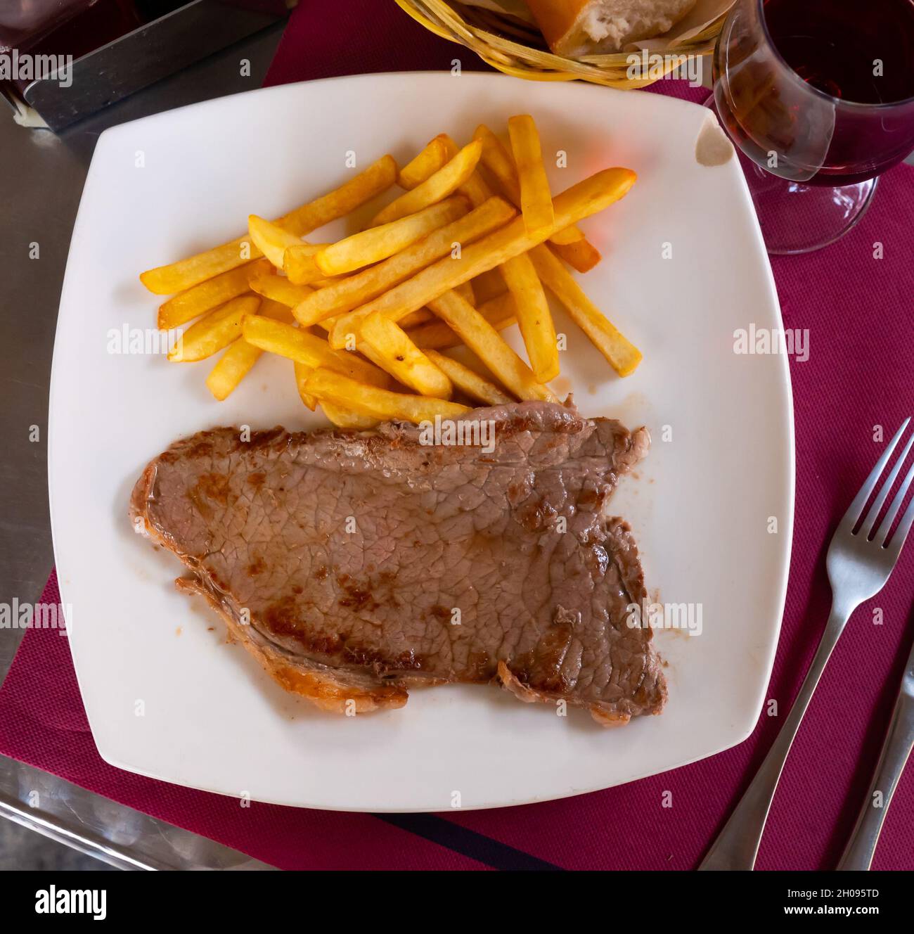 Traditional spanish grilled beef with potato Stock Photo - Alamy