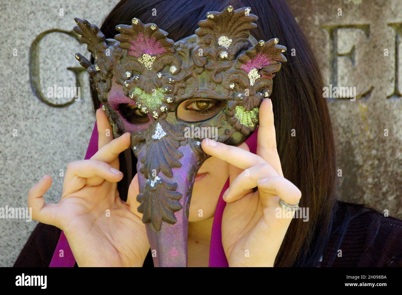 portrait of creative female in mask Stock Photo - Alamy