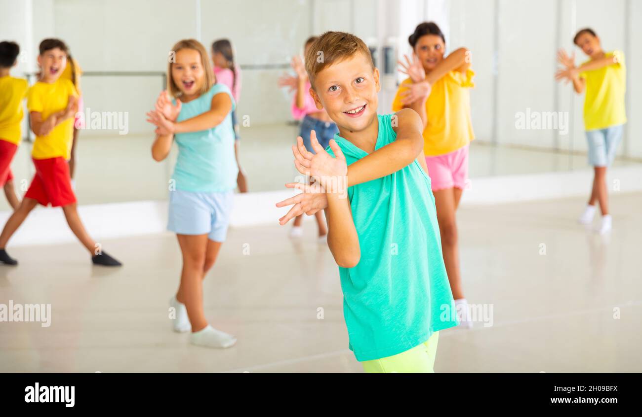 Tween boy training movements of vigorous dance in choreographical ...