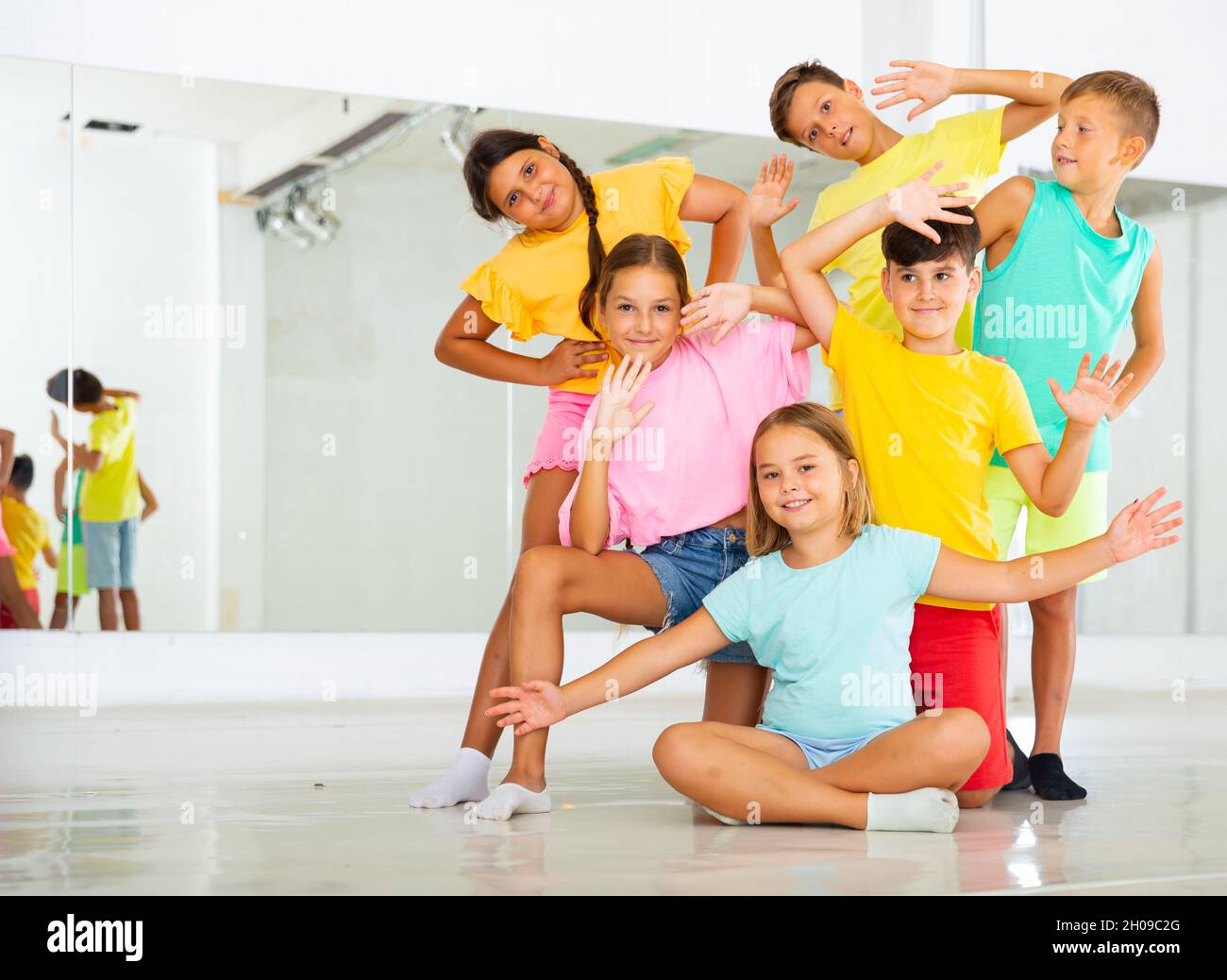 Happy children posing at modern dance class Stock Photo - Alamy