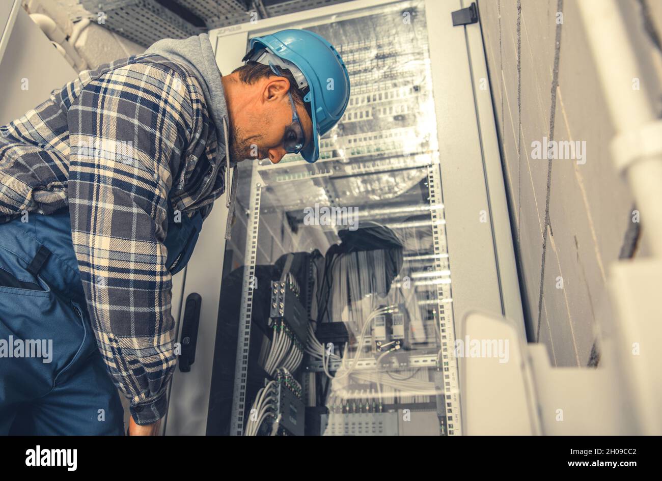 Caucasian Commercial Networks Technician in His 40s Inside a Server ...