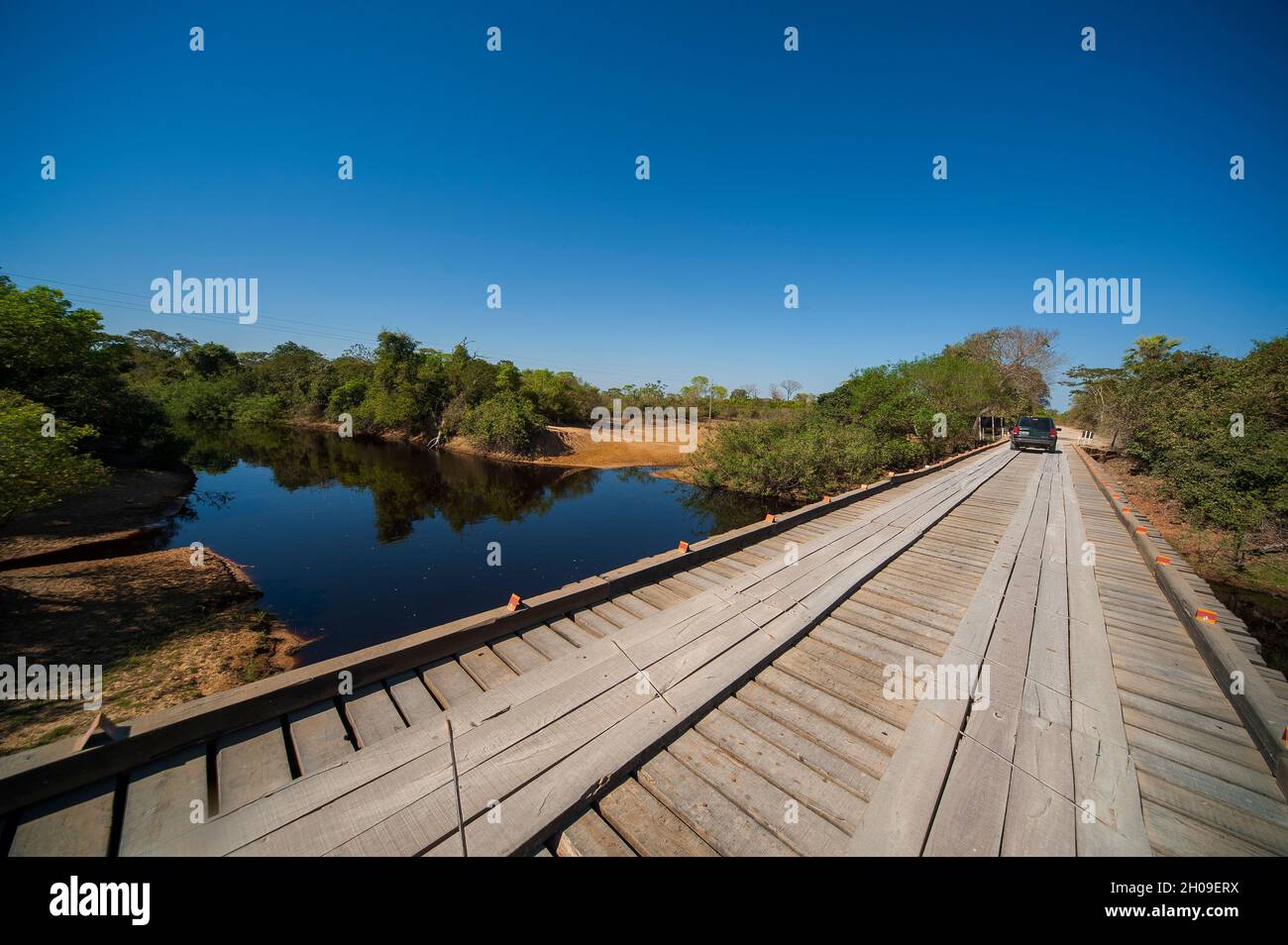 Wooden bridge on the Estrada Parque, road that crosses the south of the ...