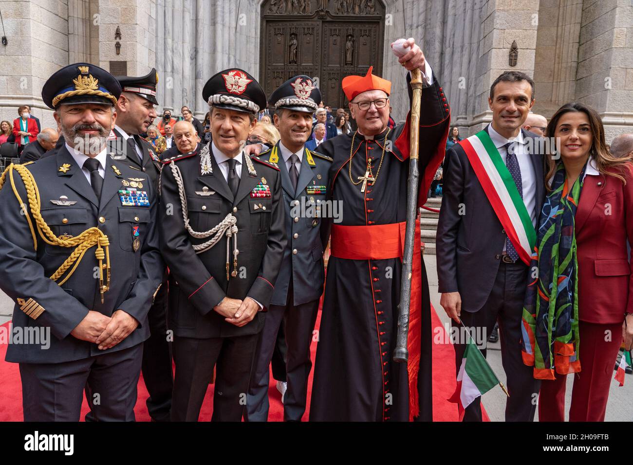 Cardinal Timothy Dolan (C) poses with the Italian Police Officers and ...