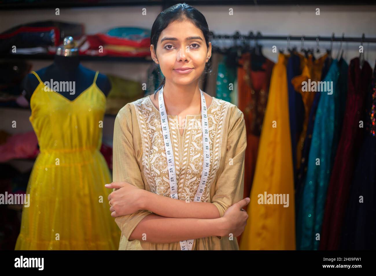 Portrait of Young happy indian woman,tailor or seamstress,fashion ...