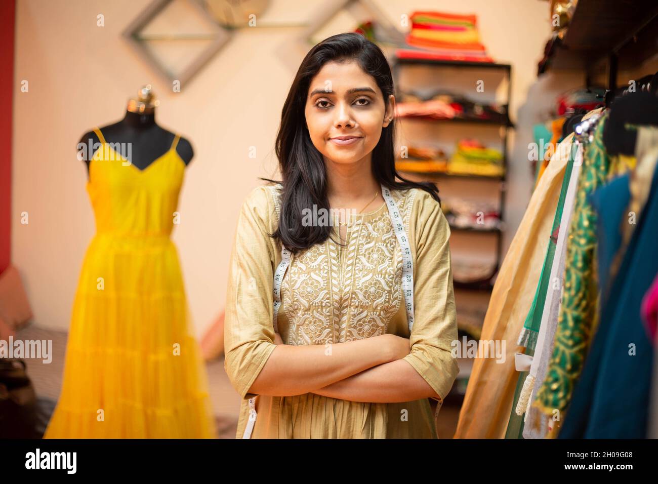 Portrait of Young indian happy woman,tailor,fashion designer,dressmaker ...