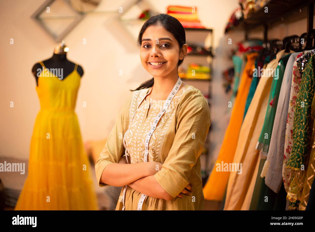Portrait of young indian happy woman tailor seamstress, fashion ...