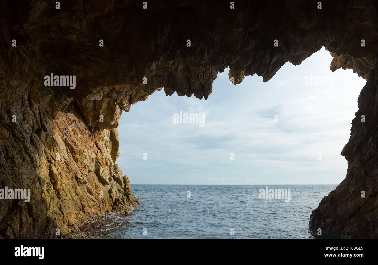 Grottos at coast Stock Photo - Alamy