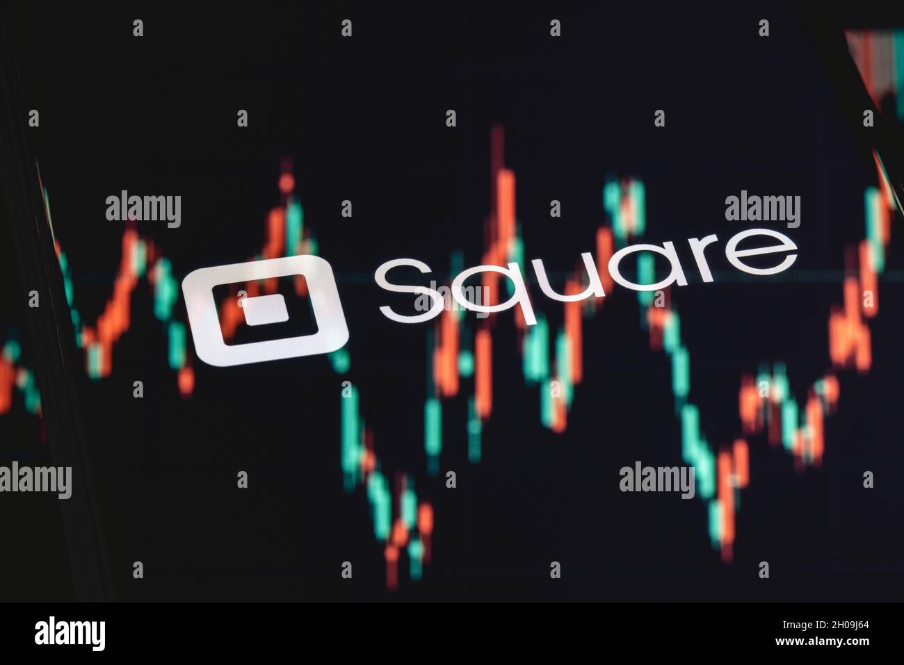 Square logo on smartphone screen. Stock chart in the reflection Stock ...