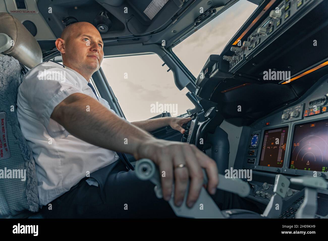 Airplane cabin crew cockpit hi-res stock photography and images - Alamy