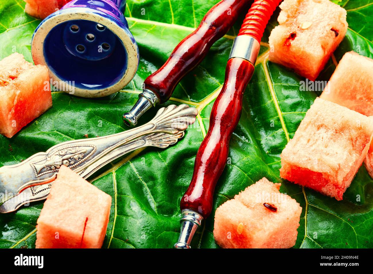 Tasty smoking hookah with watermelon flavored tobacco.Arabic shisha for ...