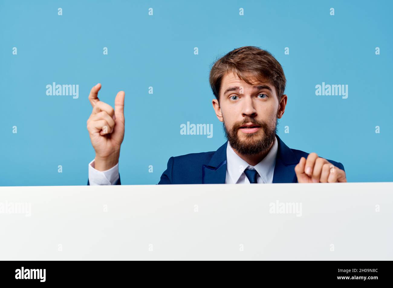 businessmen White mockup poster in hand advertising Studio Stock Photo ...