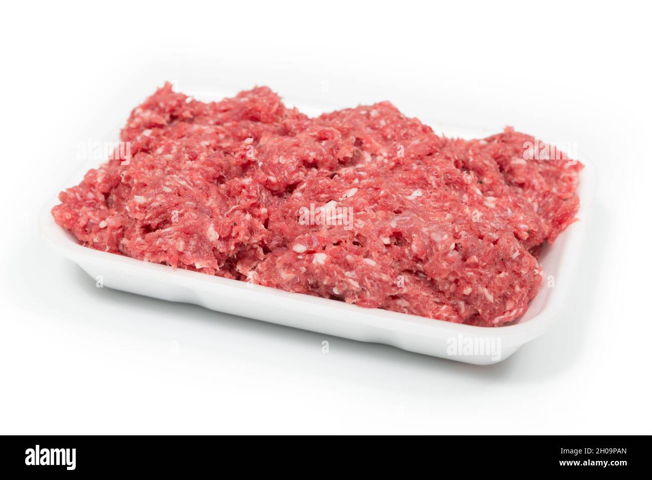 Raw minced meat in a white tray on a white background Stock Photo - Alamy