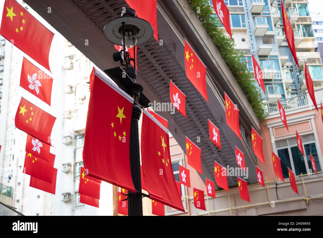 National flag of People’s republic of China and regional flag of Hong ...