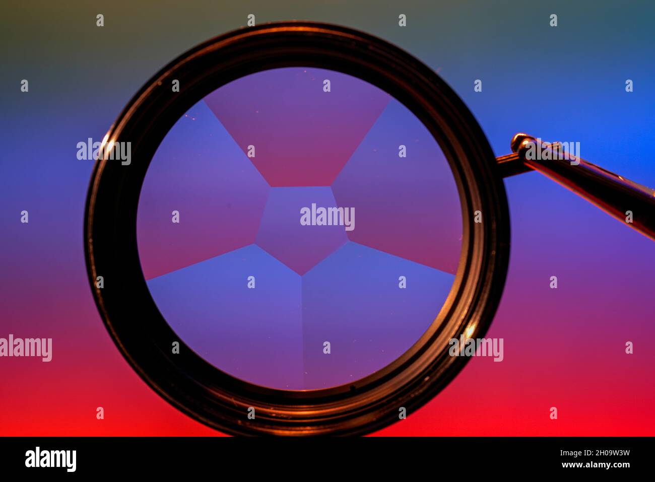 Magnifying glass on a colorful background Stock Photo - Alamy