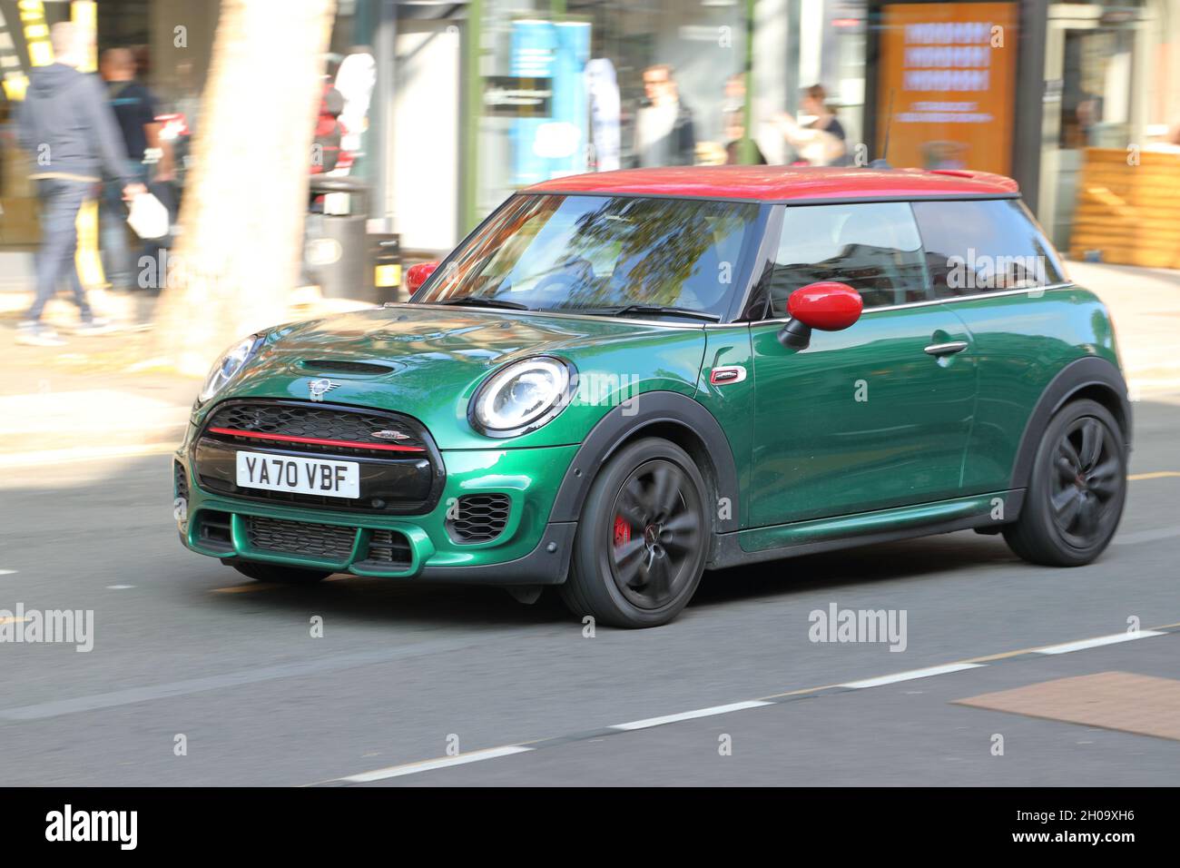 A green Mini John Cooper Works on Chiswick High Road, London, UK Stock ...