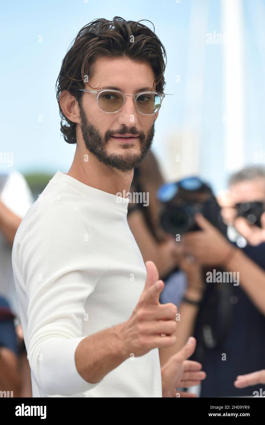74th edition of the Cannes Film Festival: actor Pierre Niney posing ...