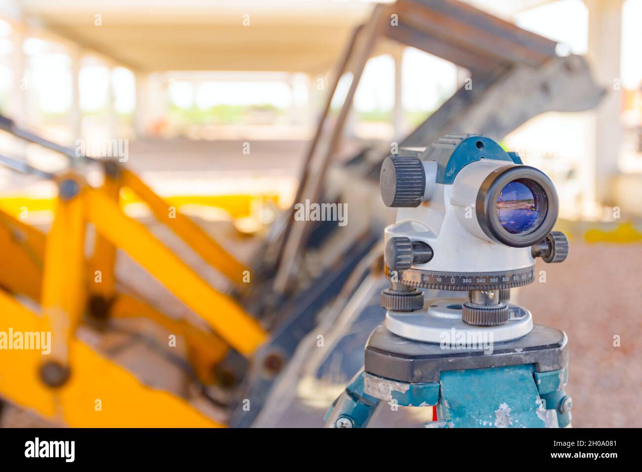 Surveyor instrument for measuring level on construction site, bulldozer ...