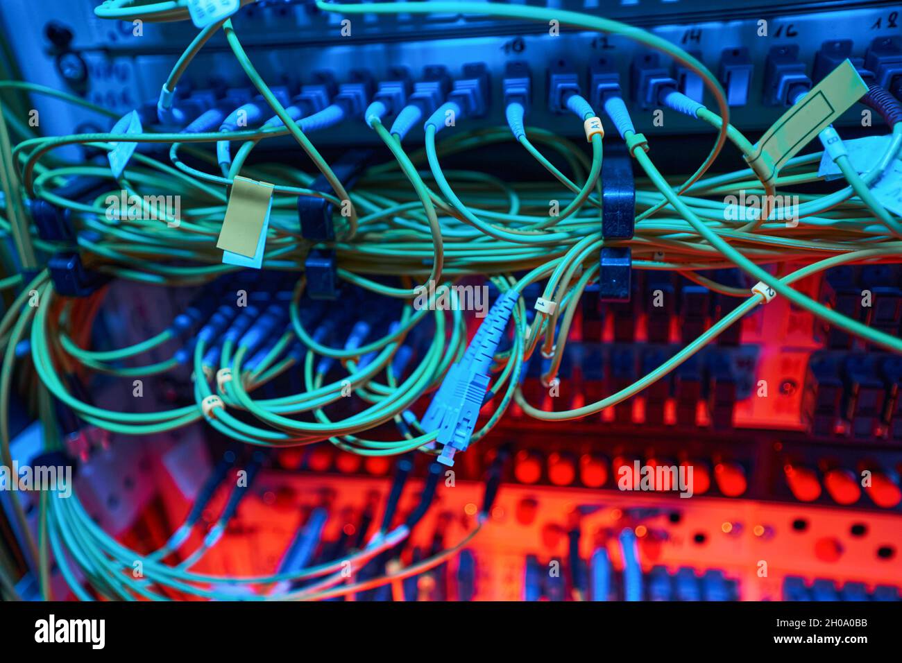 Patch panel of server cabinet with network cables Stock Photo - Alamy