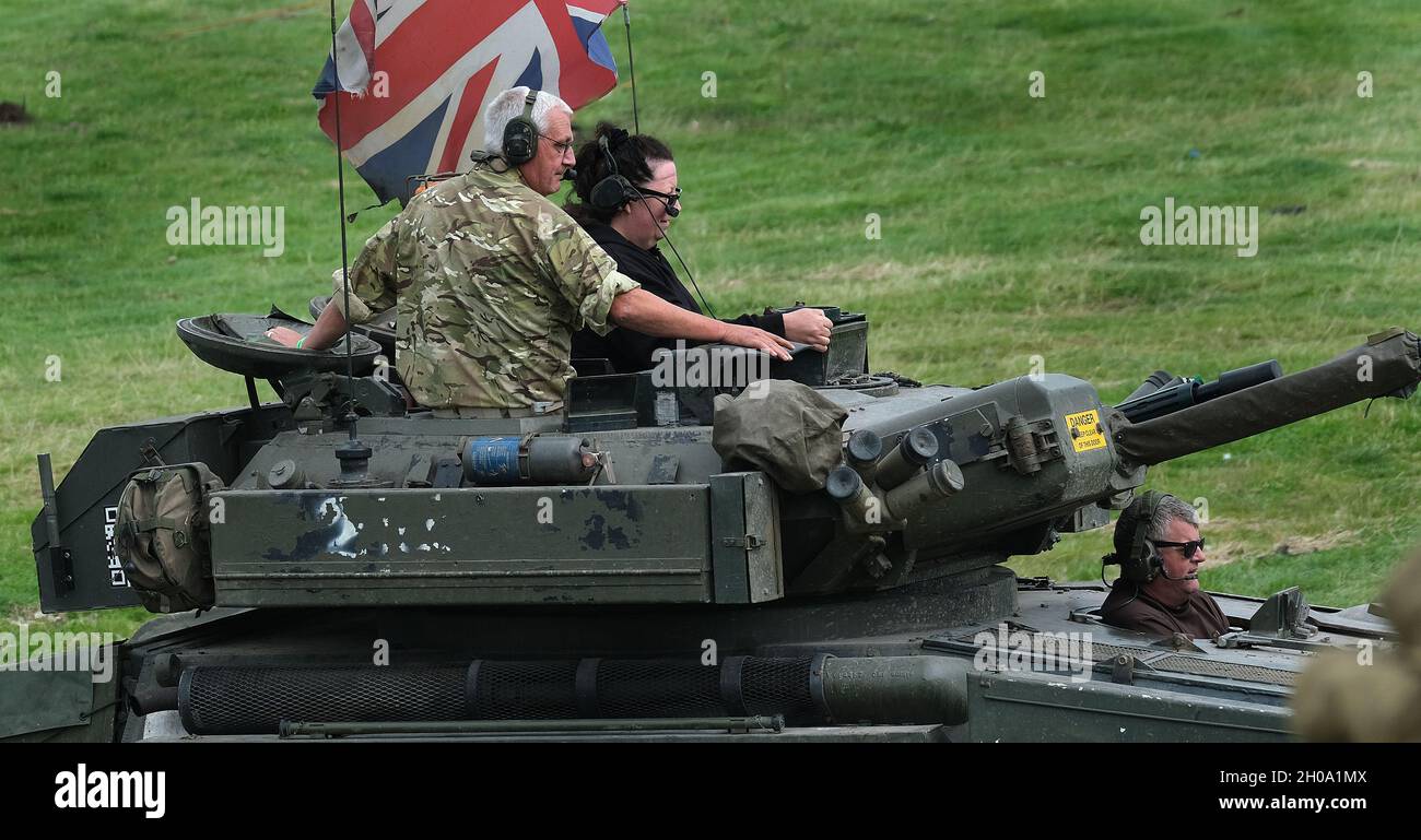 Armoured vehicle in action display at military show Stock Photo - Alamy