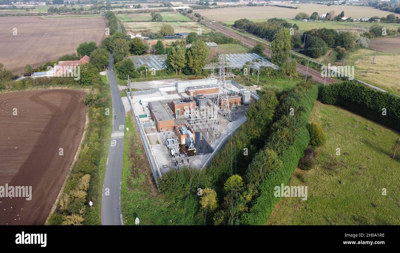 Aerial View of Electricity Sub-station, Pylons and Power Line Cables ...