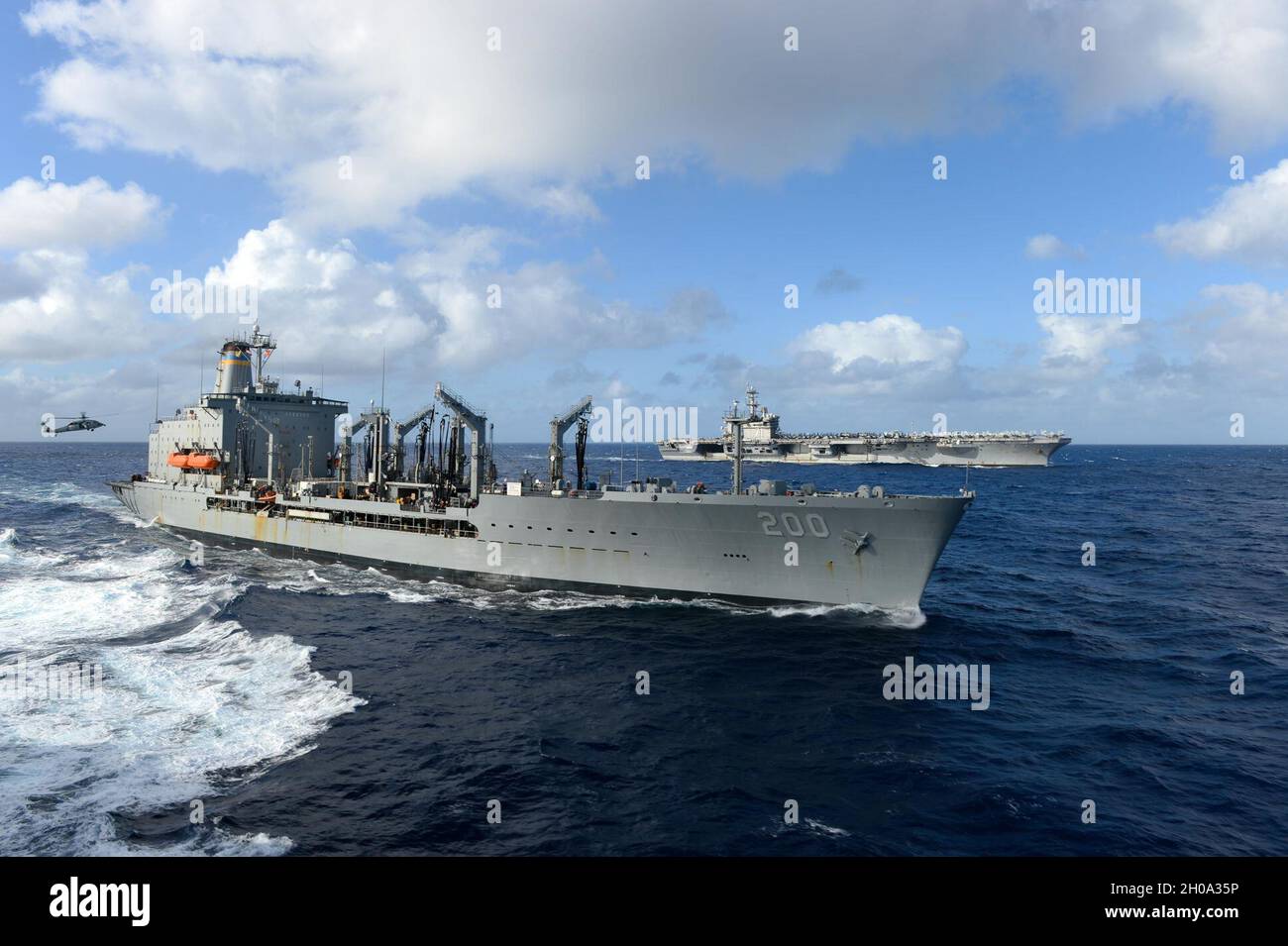 PACIFIC OCEAN (Jan. 1, 2021) The aircraft carrier USS Theodore Roosevelt (CVN 71), back ...