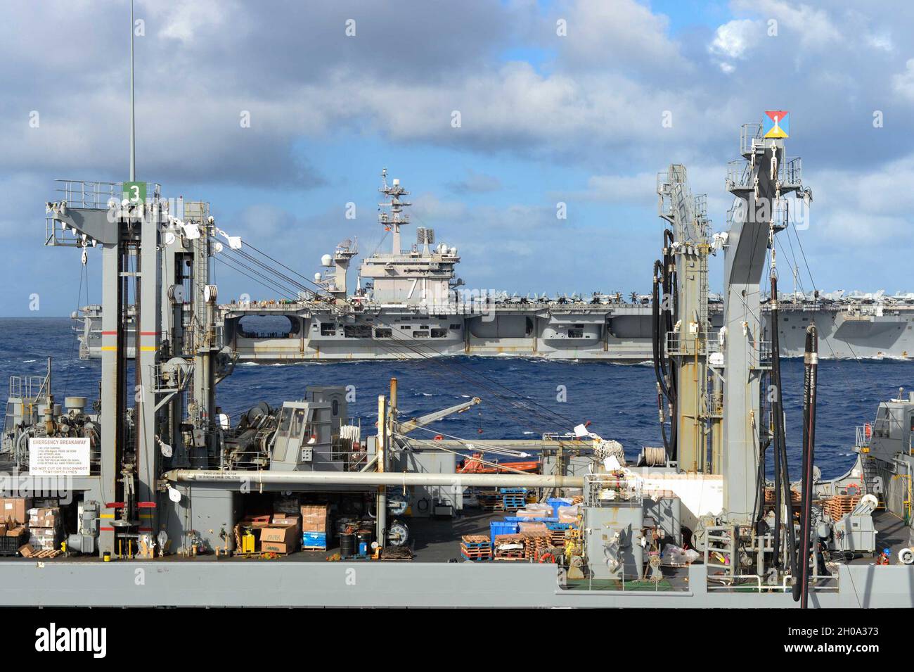 PACIFIC OCEAN (Jan. 1, 2021) The aircraft carrier USS Theodore Roosevelt (CVN 71), back ...