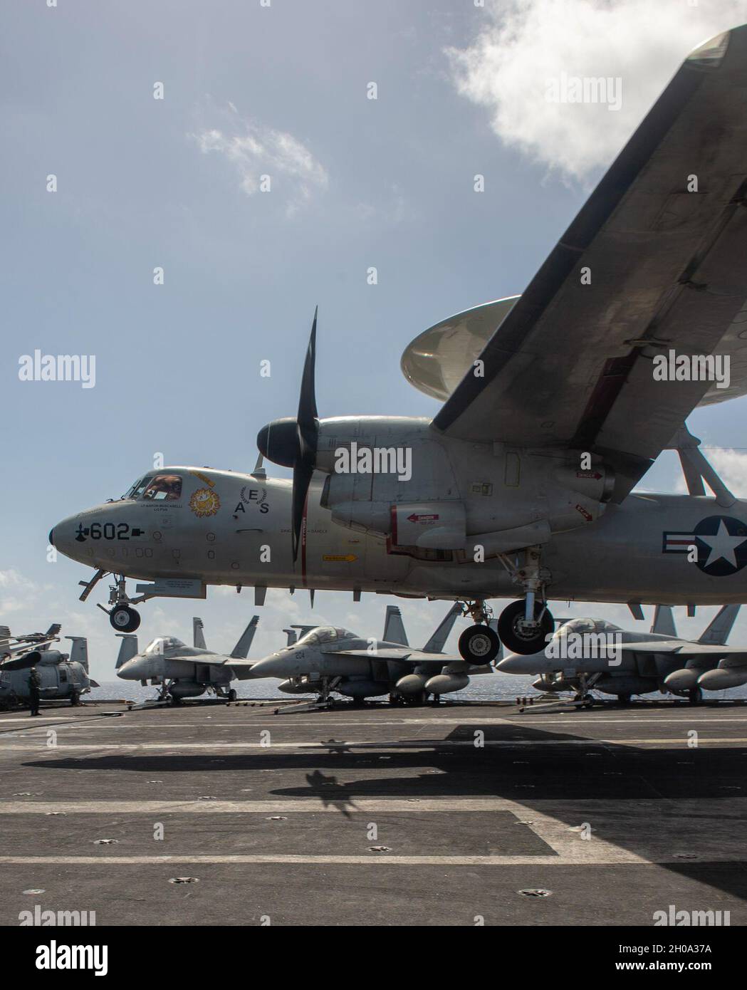 210101-N-EB640-1114 INDIAN OCEAN (Jan. 1, 2021) An E-2C Hawkeye, from ...